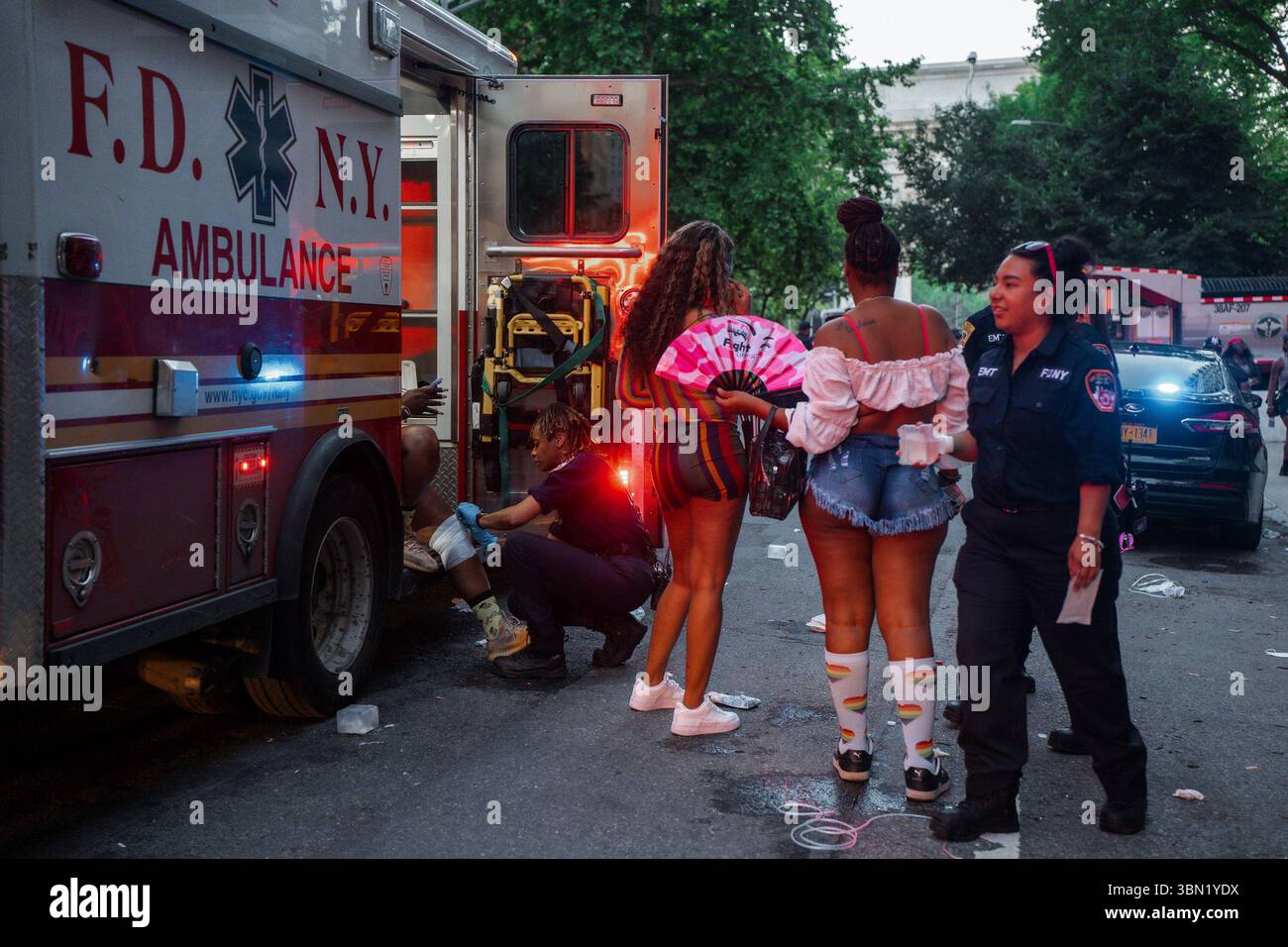 Victims receive treatment after pepper spray is deployed during a fight in Washington Square ...