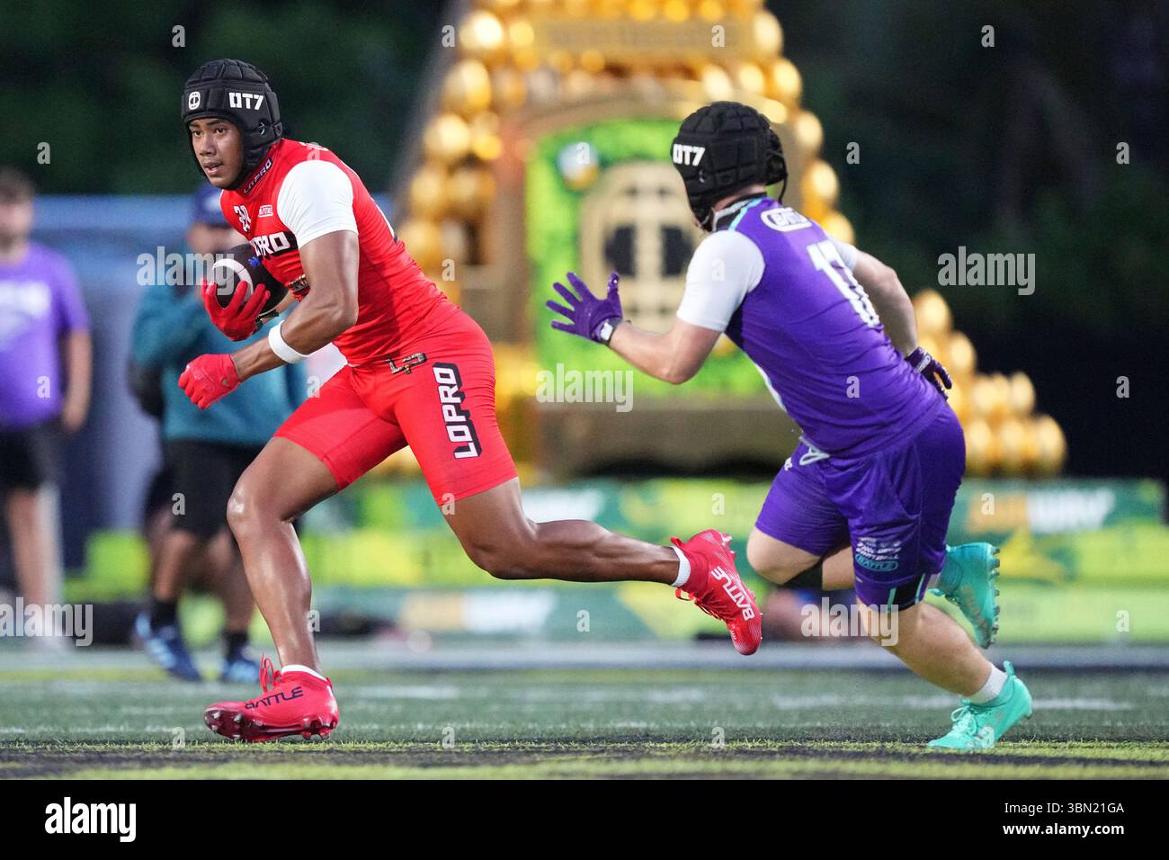 Lo-Pro tight end Taimane Purcell, left, looks for running room as he ...