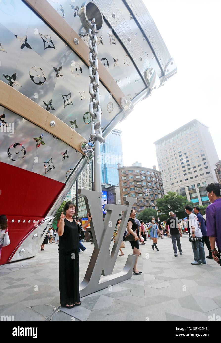 Tourists visit the world's only giant wheel-shaped building of French ...