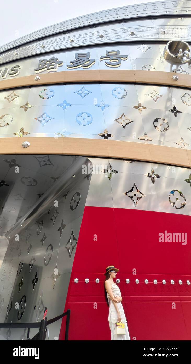 Tourists visit the world's only giant wheel-shaped building of French ...
