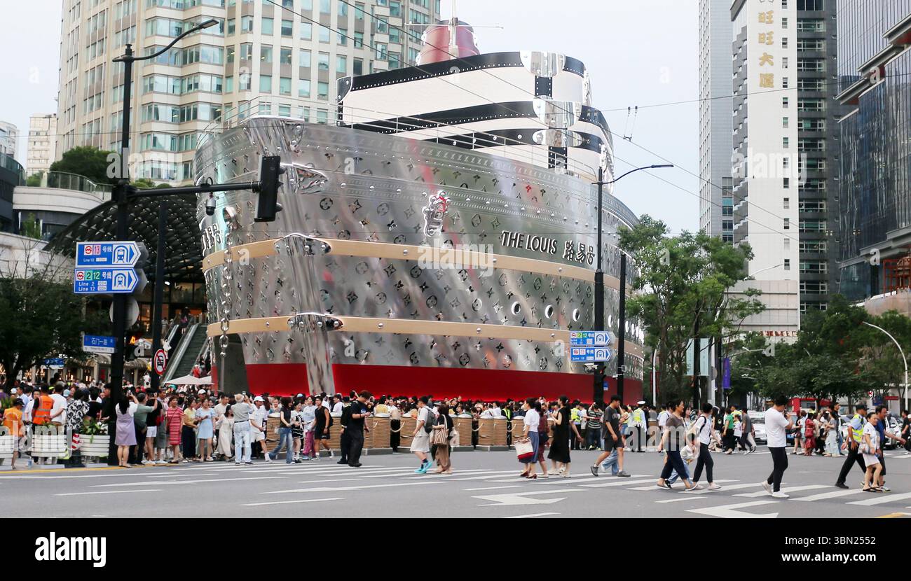 Tourists visit the world's only giant wheel-shaped building of French ...