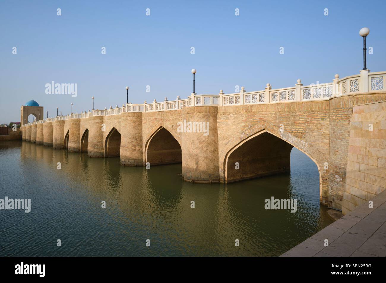 A new, brick arch bridge over the Kashkadarya river. In Qarshi ...