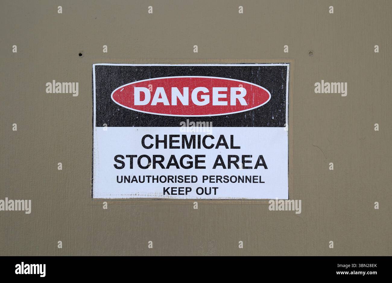 Danger - Chemical Storage Area sign attached to a beige wall Stock ...
