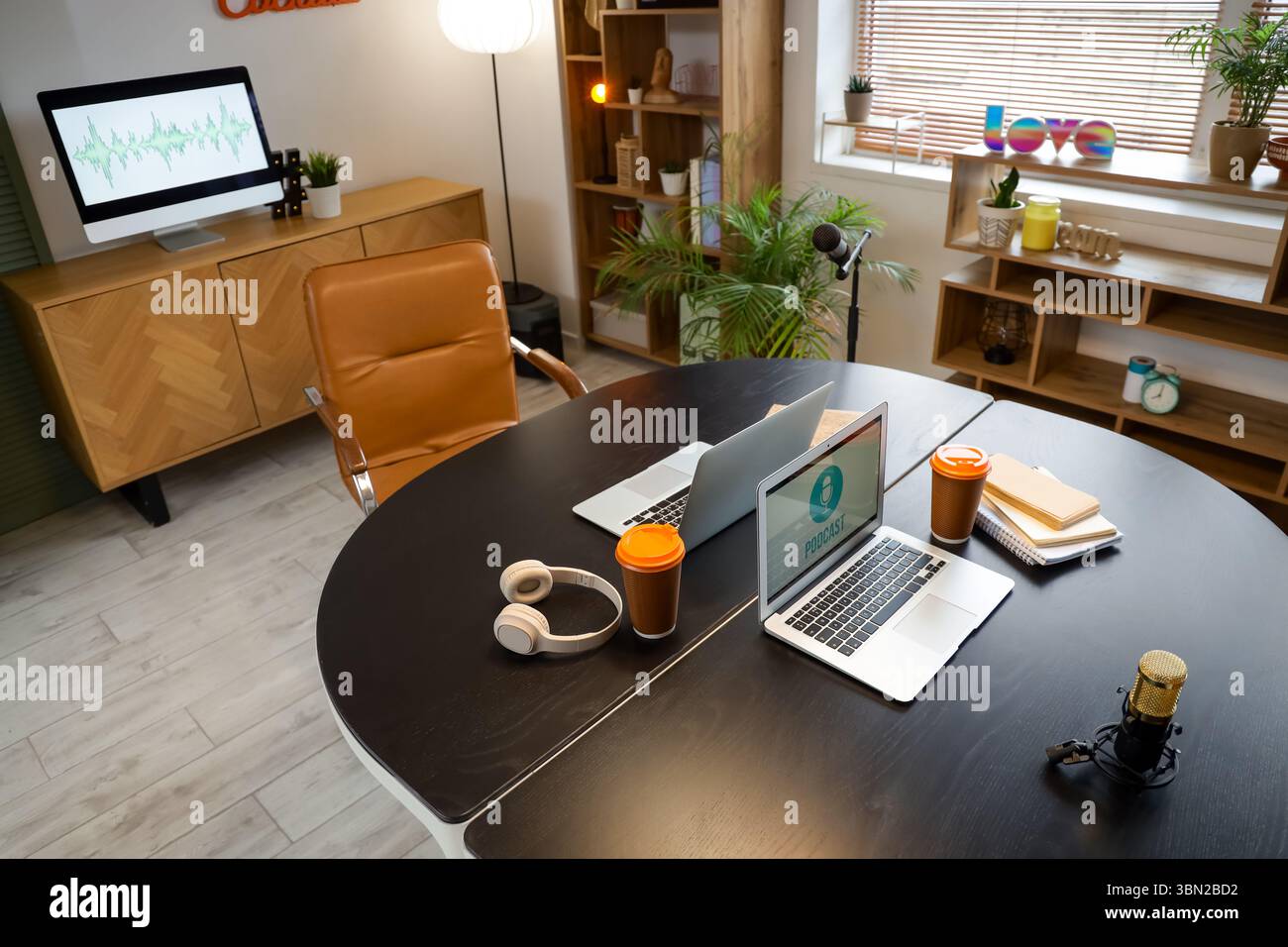 Interior of podcaster's studio with workplace and shelf units Stock ...