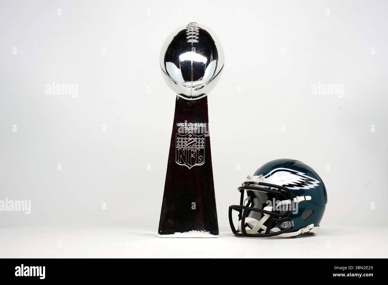 A Philadelphia Eagles helmet and Super Bowl Vince Lombardi Trophy on ...