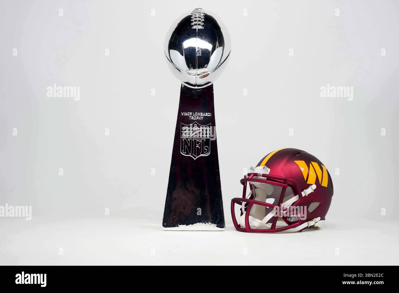 A Washington Commanders helmet and Super Bowl Vince Lombardi Trophy on ...