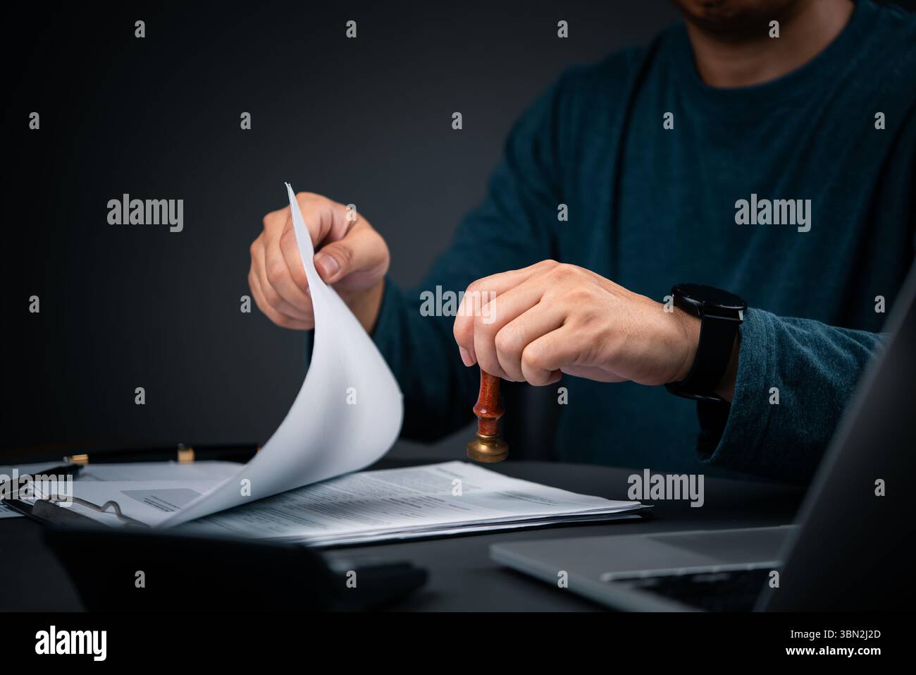 Man stamping official document. Legal contract approval and certified ...