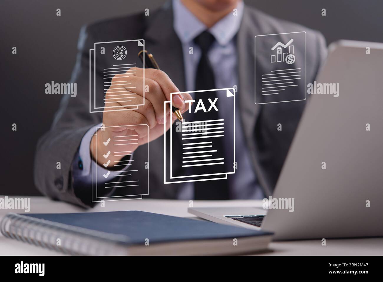 businessman reviewing and signing tax documents, with digital icons ...