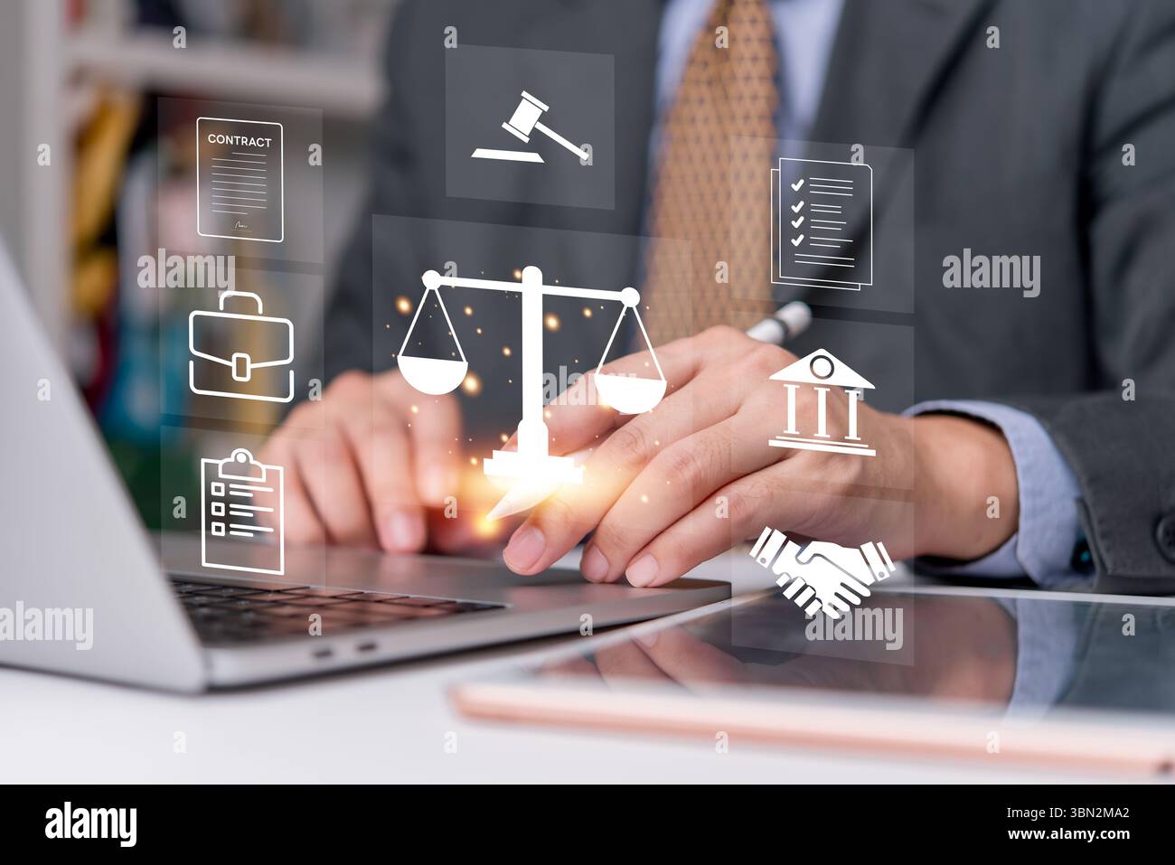 Lawyer using laptop with digital justice icons, symbolizing online ...