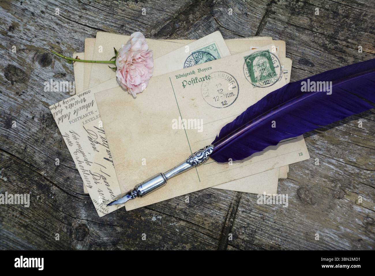 Old blank vintage postcard with old stamp lies with other postcards on ...