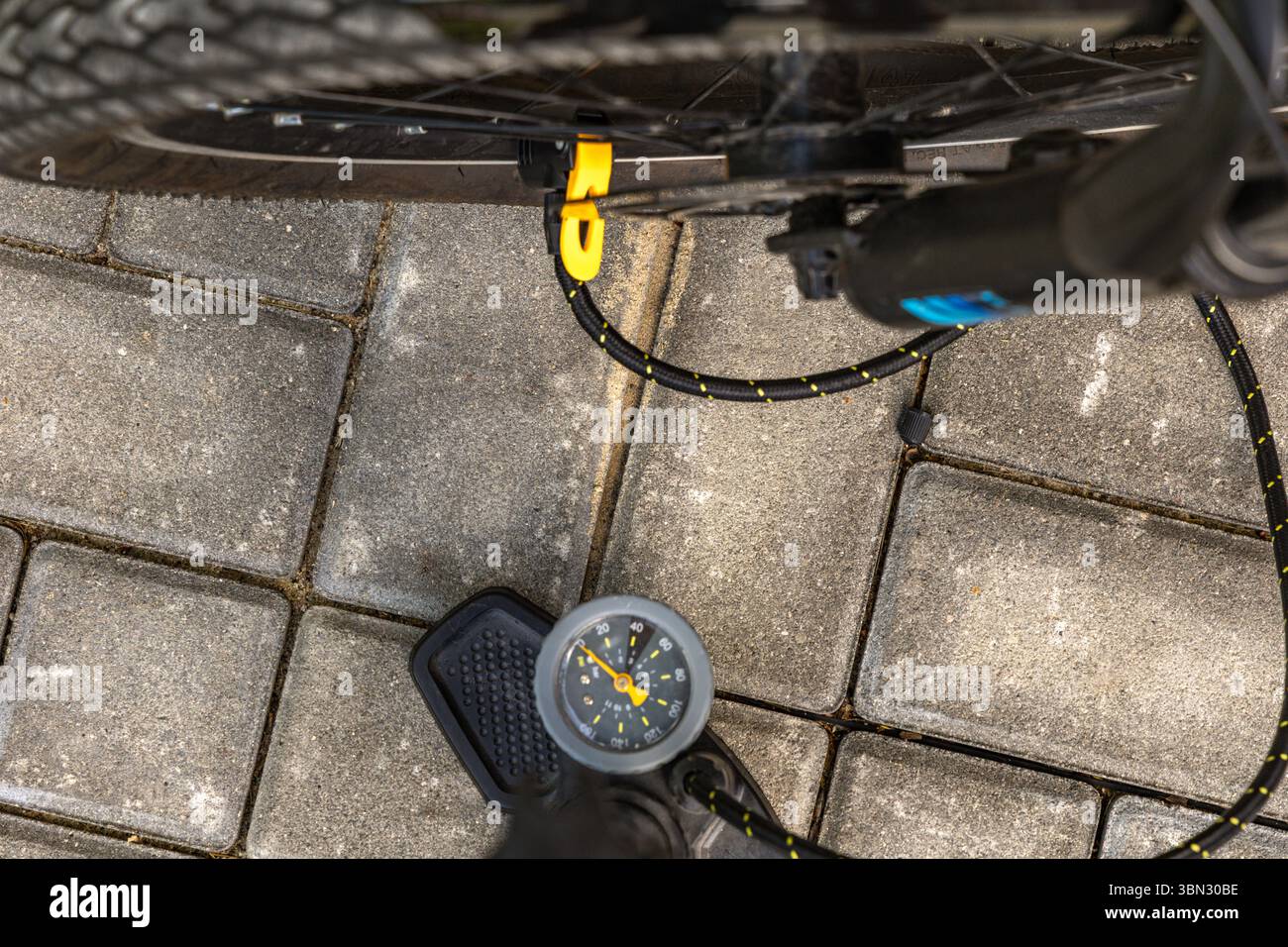 Flat tire on electric bike, pumping air into bike inner tube, bike inspection and repair before ...