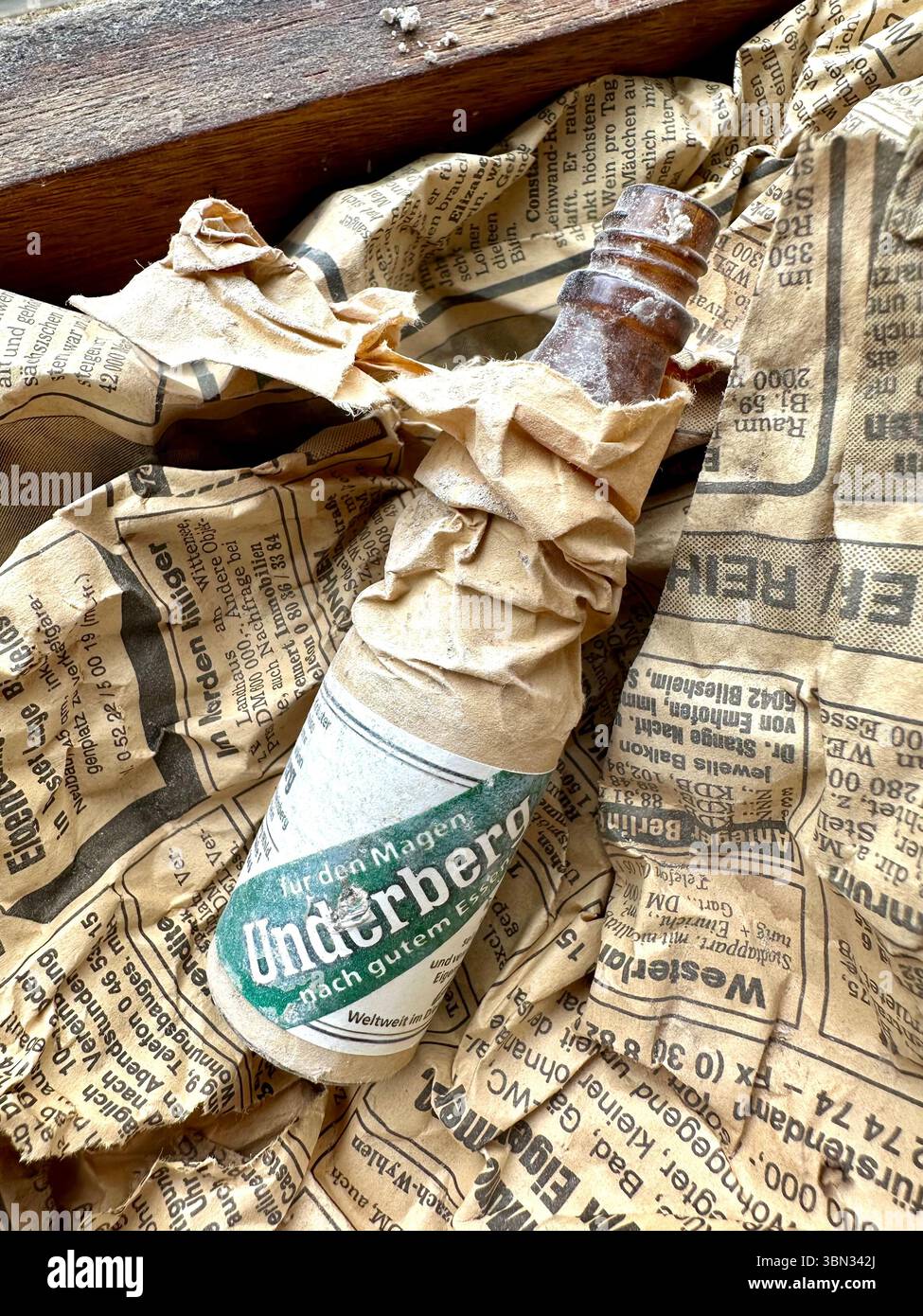 An empty vintage bottle of Underberg Stock Photo - Alamy
