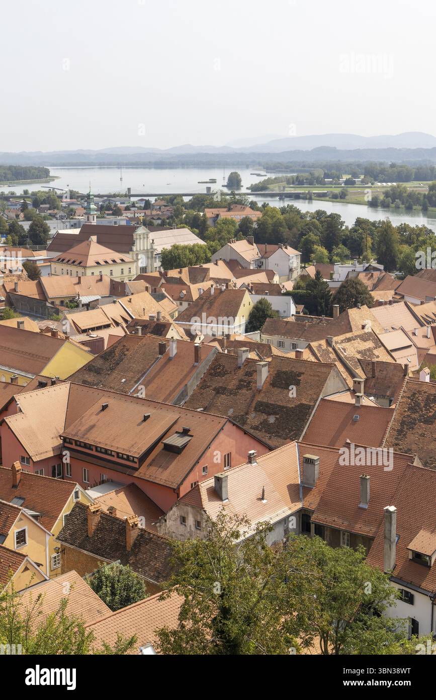 Scenic view from medieval castle of Ptuj with main city tower and river ...