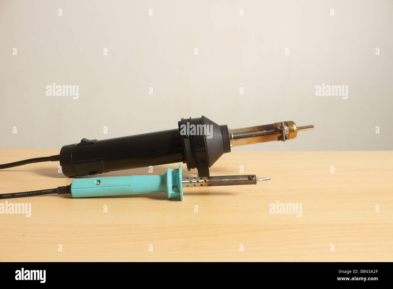 soldering iron heat gun isolated on white Stock Photo - Alamy