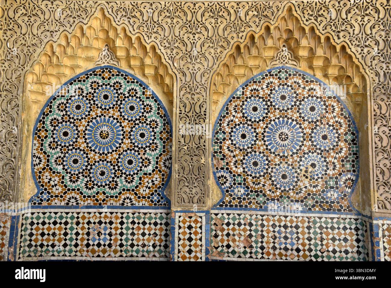Traditional ornate and colorful arabesque carvings, mosaic tiles ...