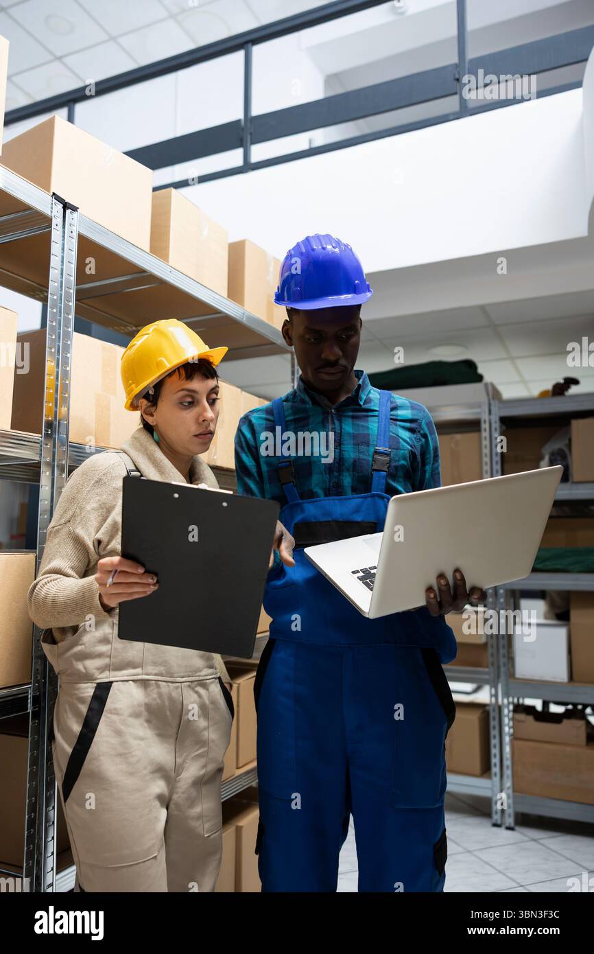Warehouse factory management team overseeing hi-res stock photography and images - Alamy