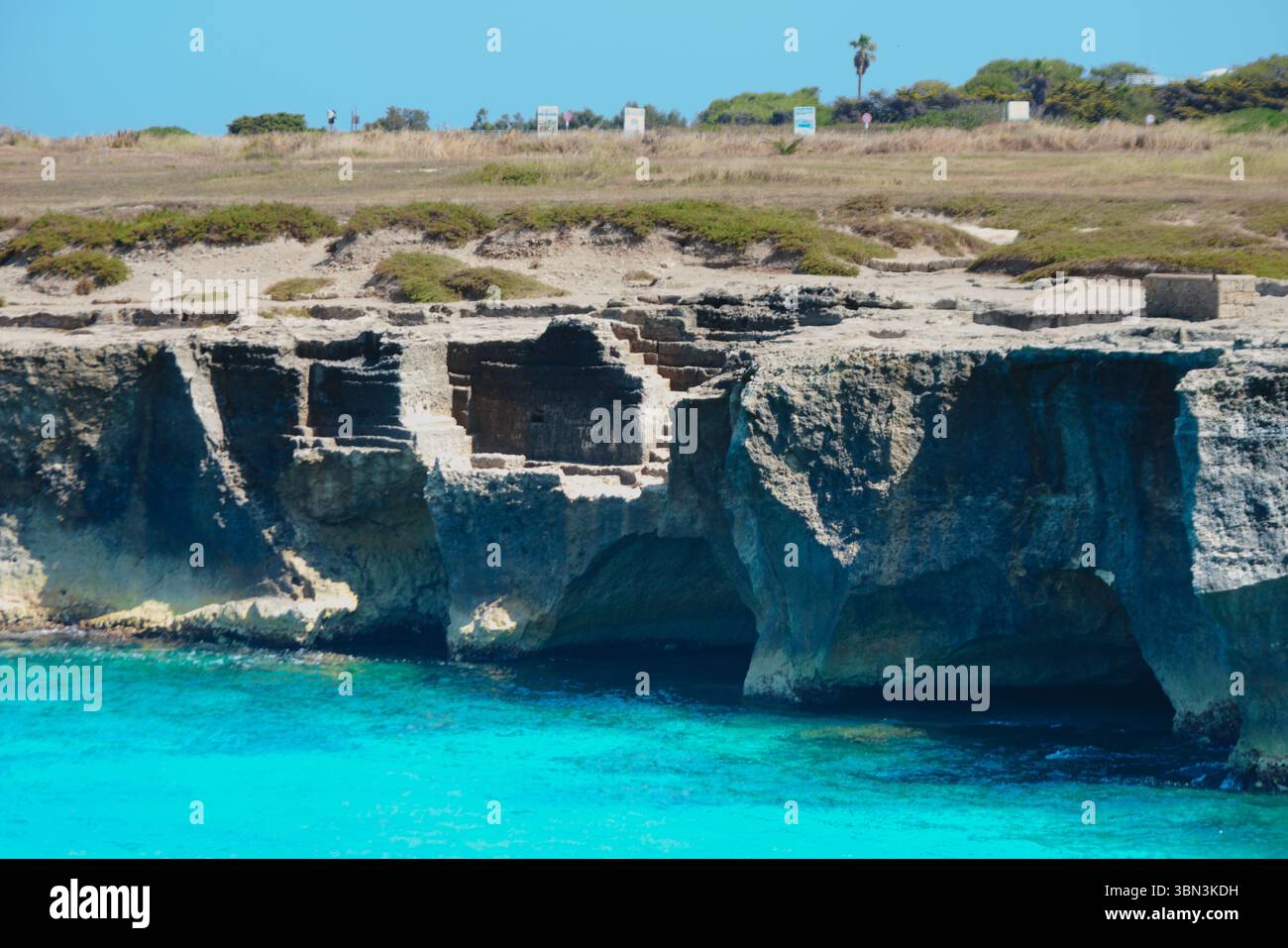 Rock-hewn caves in the archaeological site of Roca Vecchia (Apulia ...