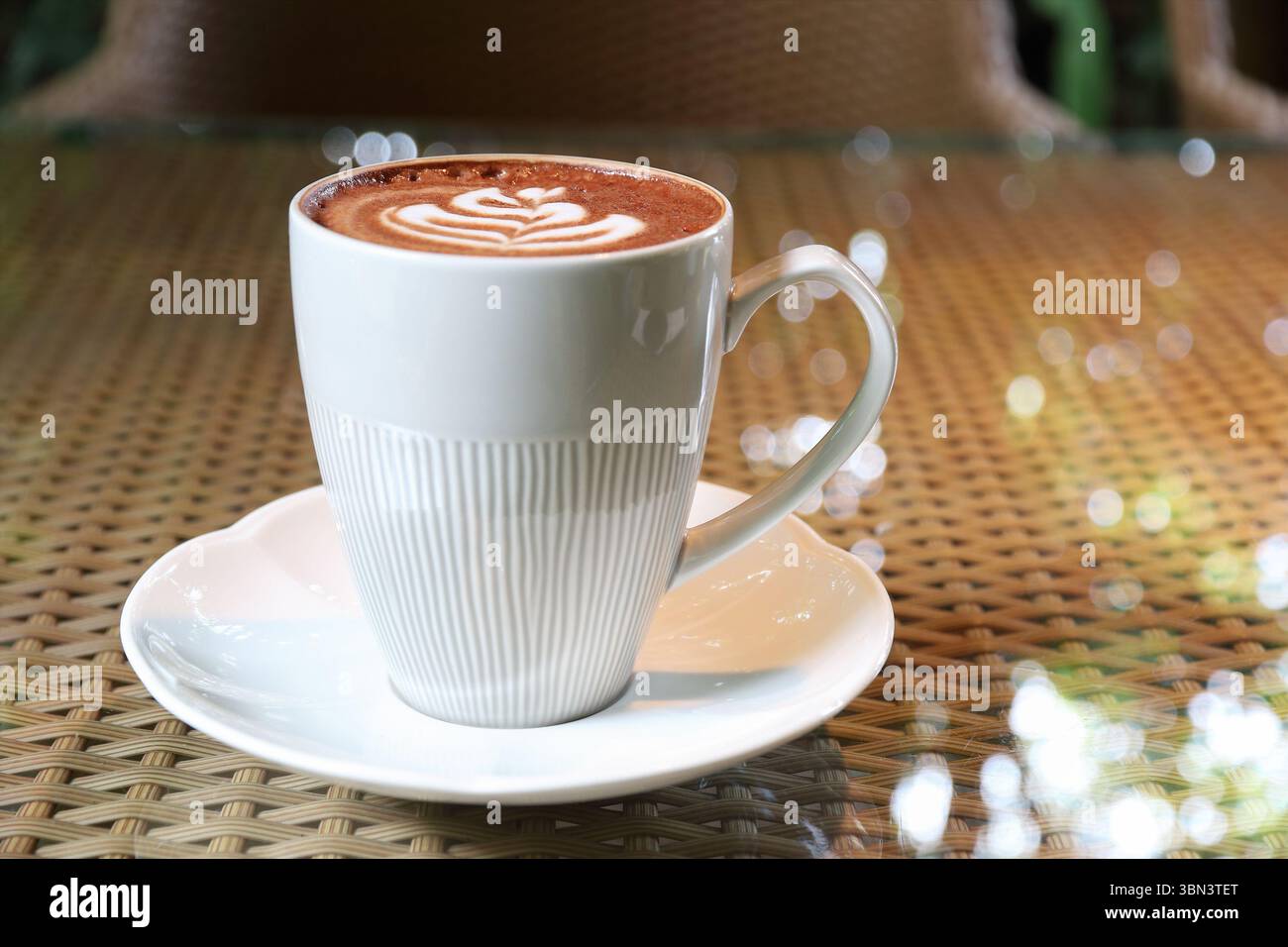 Cappuccino love on glass table hi-res stock photography and images - Alamy