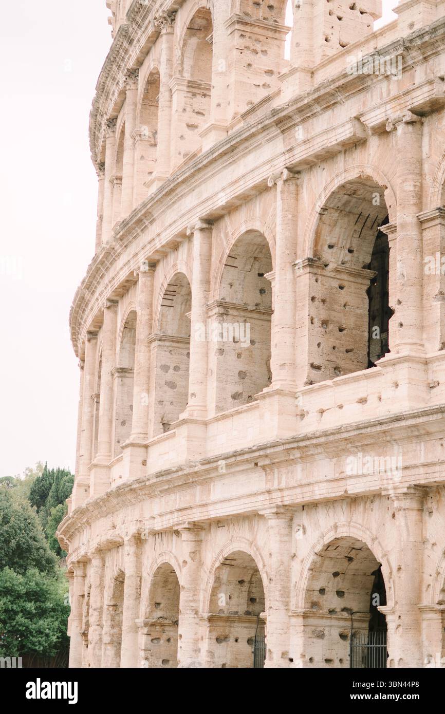 Stone arches and weathered facade of Colosseum in Rome Stock Photo - Alamy
