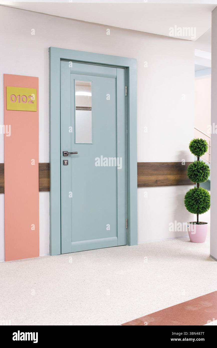Closed door to the patient room. Hospital interior. New clinic design ...