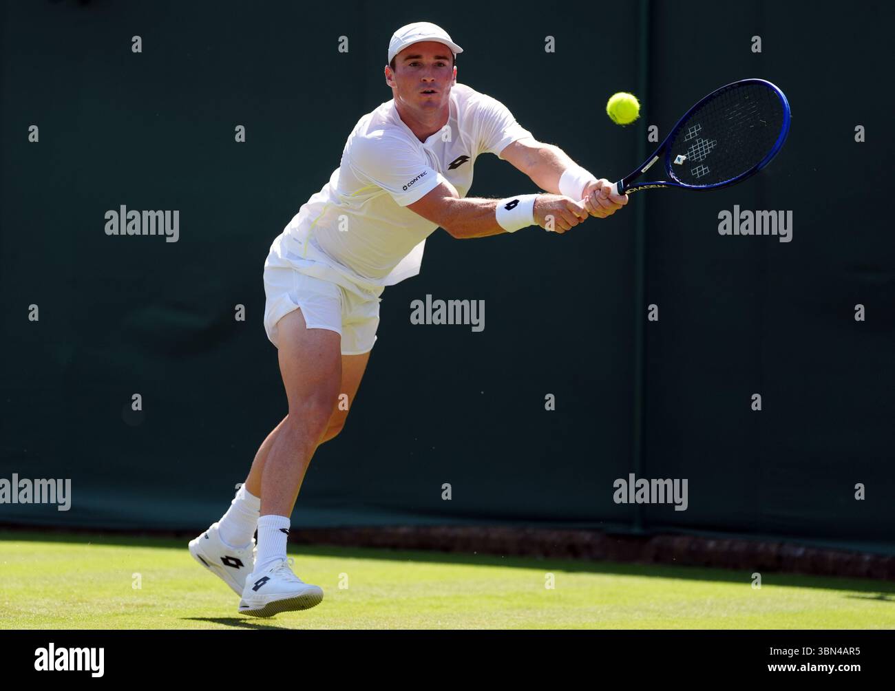 Oliver Crawford during his match against Mattia Bellucci on day one of the 2025 Wimbledon ...