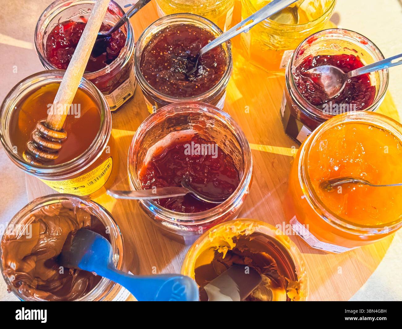 Breakfast, honey, Nutella and jam Stock Photo - Alamy