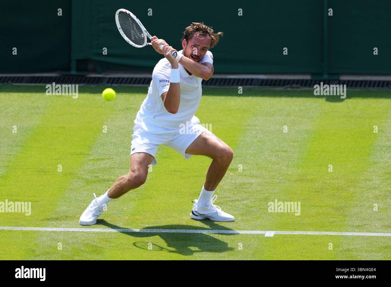 Daniil Medvedev of Russia returns the ball to Benjamin Bonzi of France ...