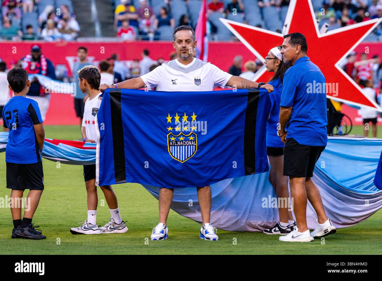 Chicago, United States. 28th June, 2025. A Chicago Fire fan holds up a ...
