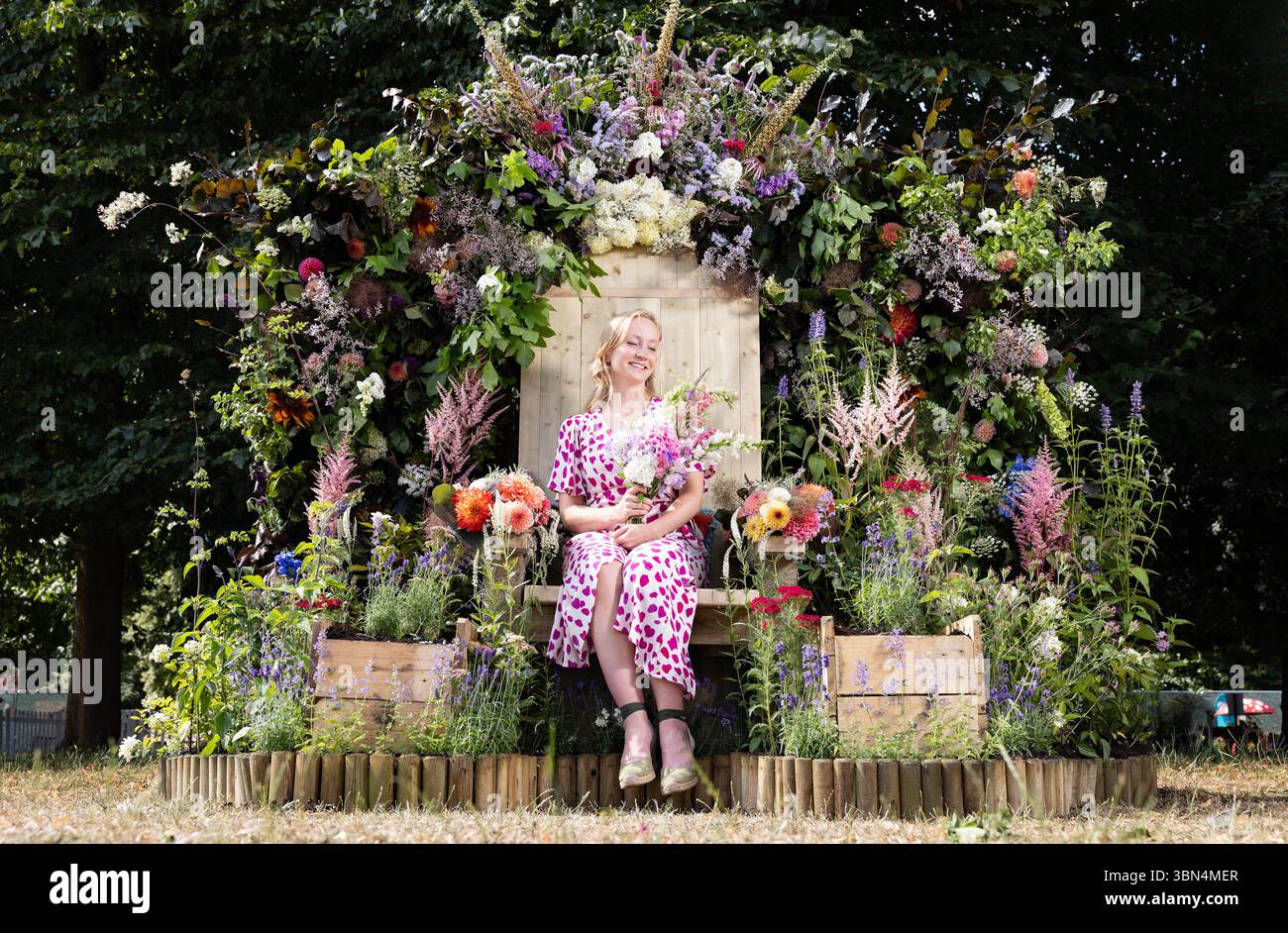 EDITORIAL USE ONLY Jess Porter from London sits on the Living Throne ...