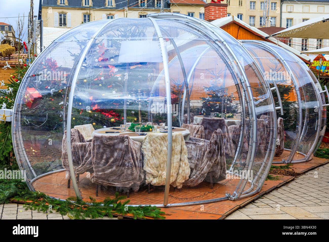 Nancy, Christmas market. Transparent bubble of a restaurant with a ...