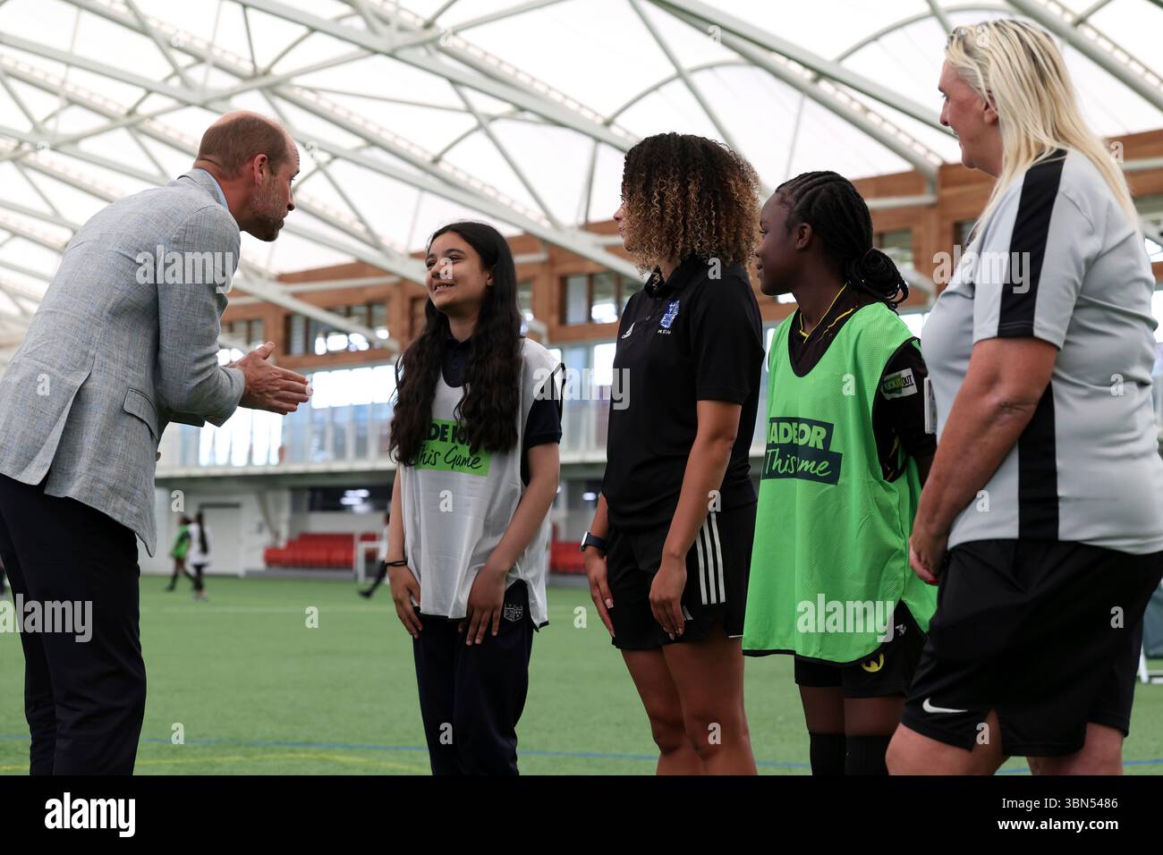 The Prince of Wales speaks to young players as he visits St George's ...