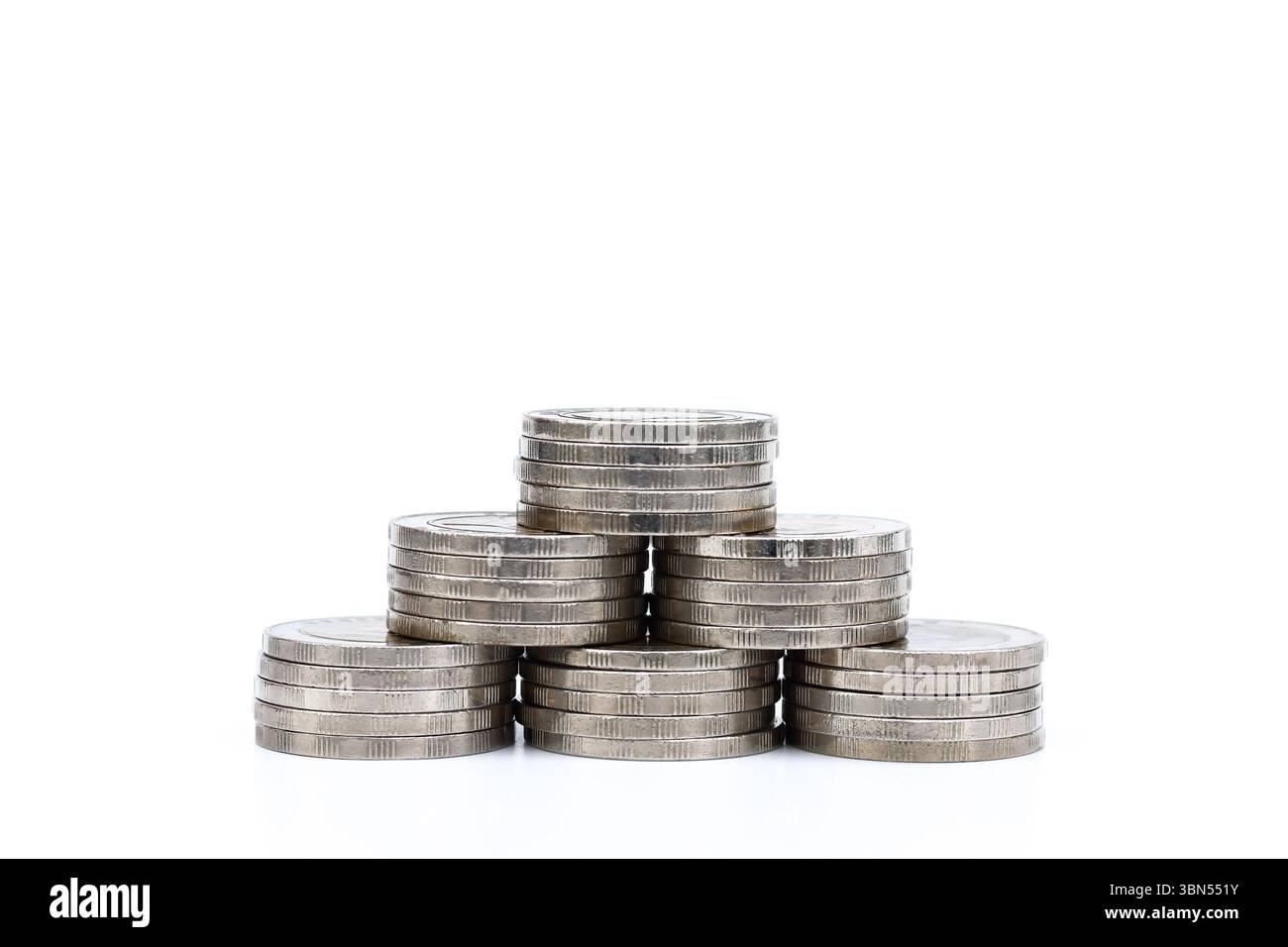 stack of steps growing coin isolated on white Stock Photo - Alamy