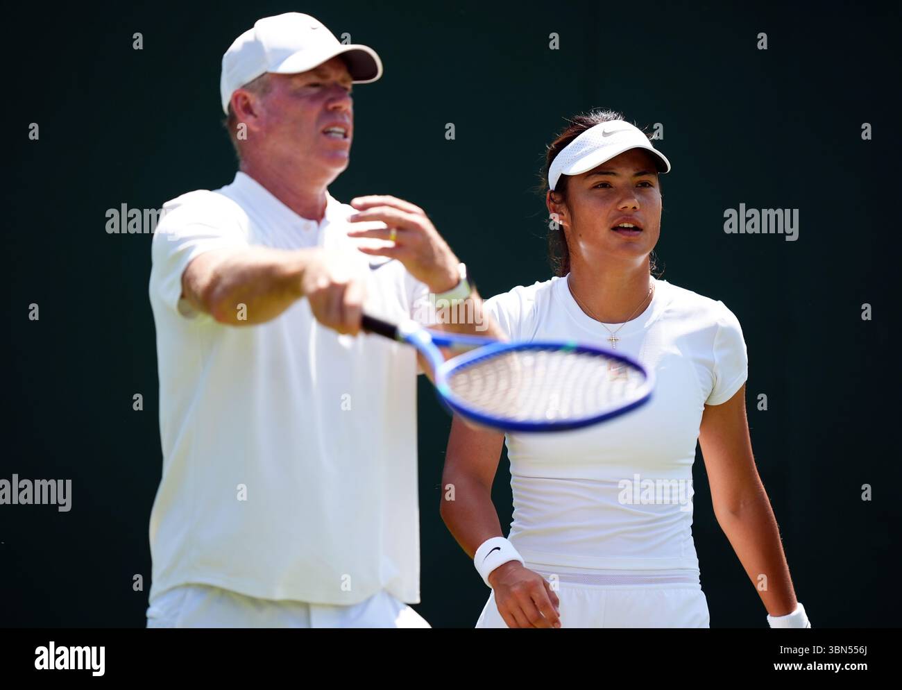 Emma Raducanu with coach Mark Petchey during a practice session on day ...