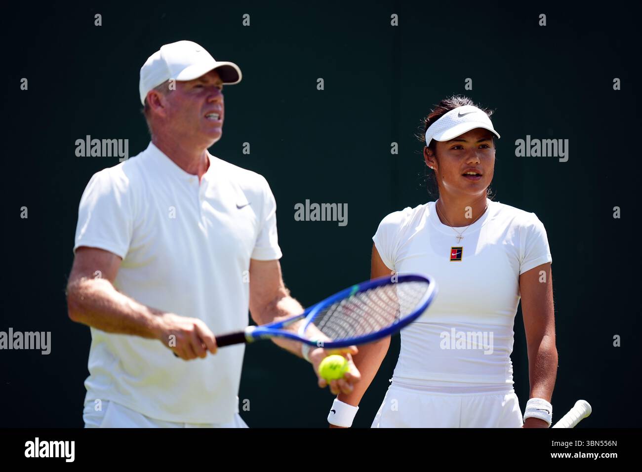 Emma Raducanu with coach Mark Petchey during a practice session on day ...