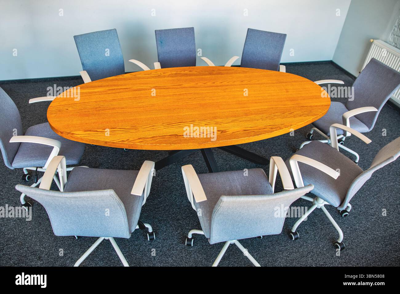 Modern empty meeting room with wooden table and office chairs Stock ...