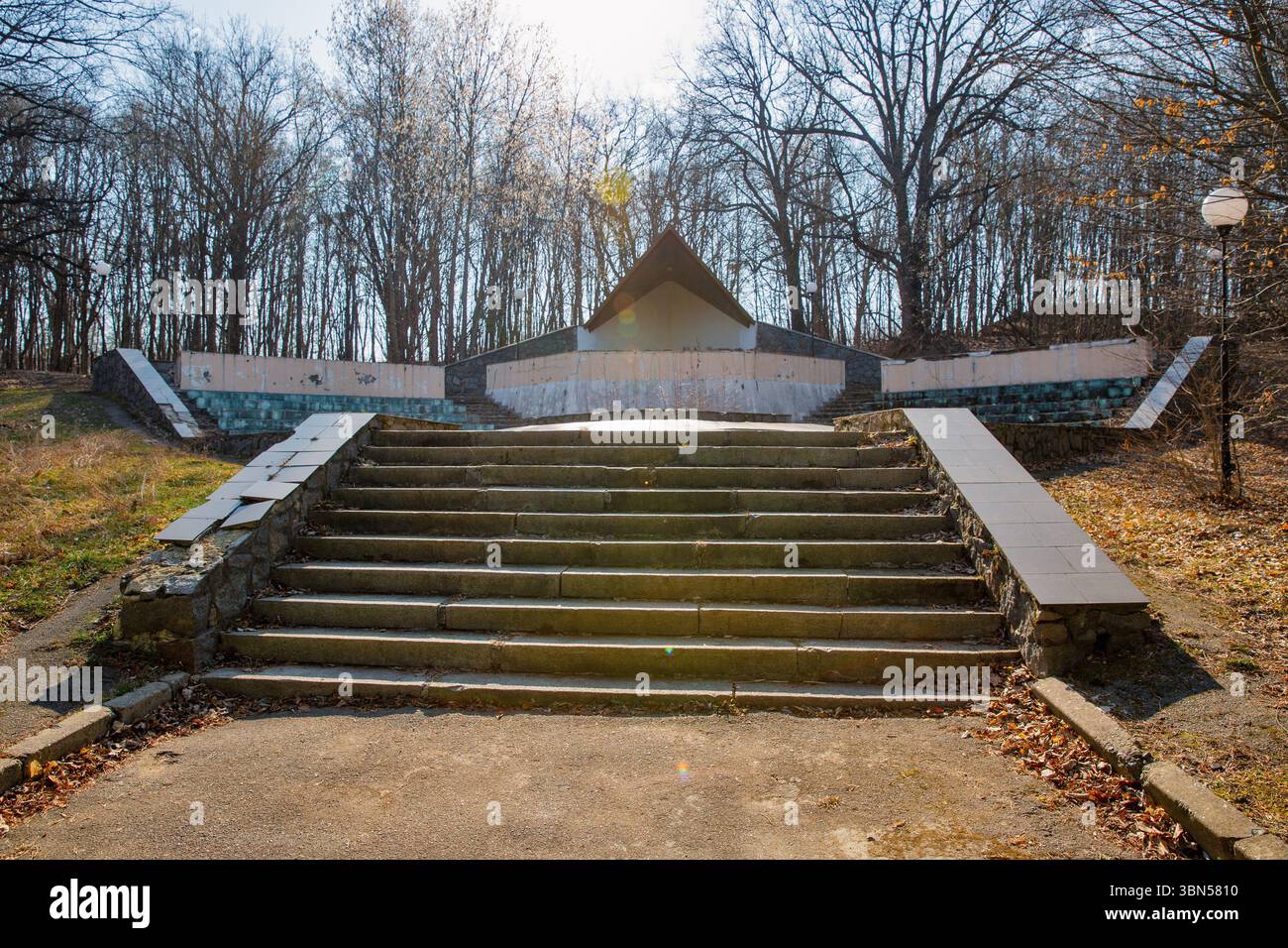 Forgotten monument in the forest. Neglected public structure in ...