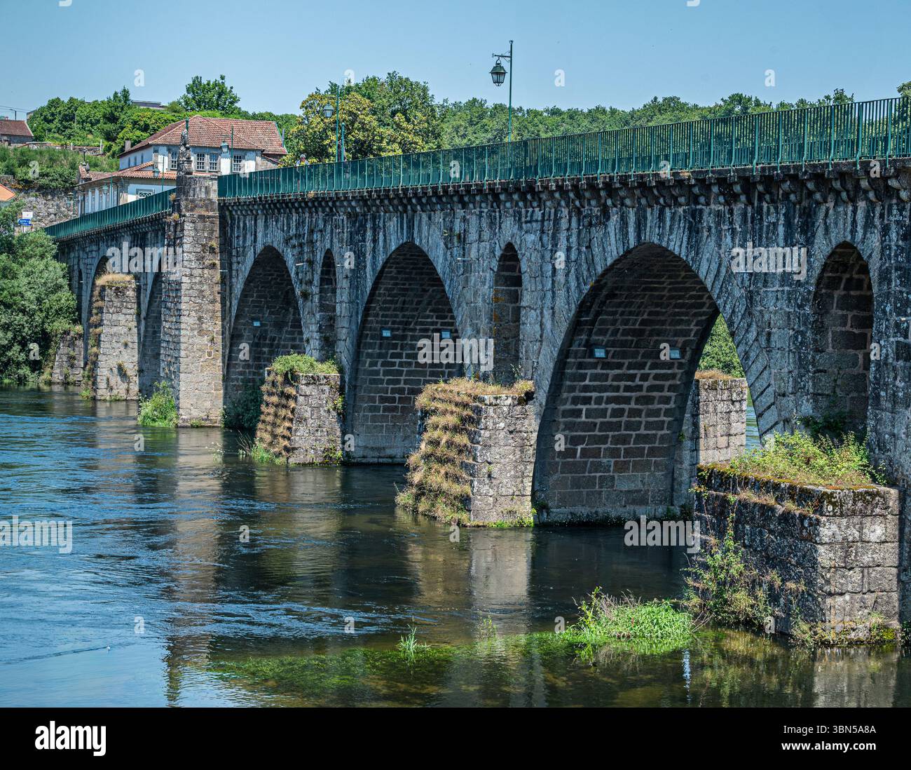 The Roman bridge crossing the old town of Ponte de Lima, North Portugal ...