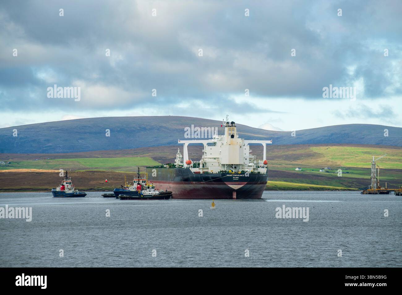 An oil tanker berths at the EnQuest-operated Sullom Voe Oil Terminal in ...