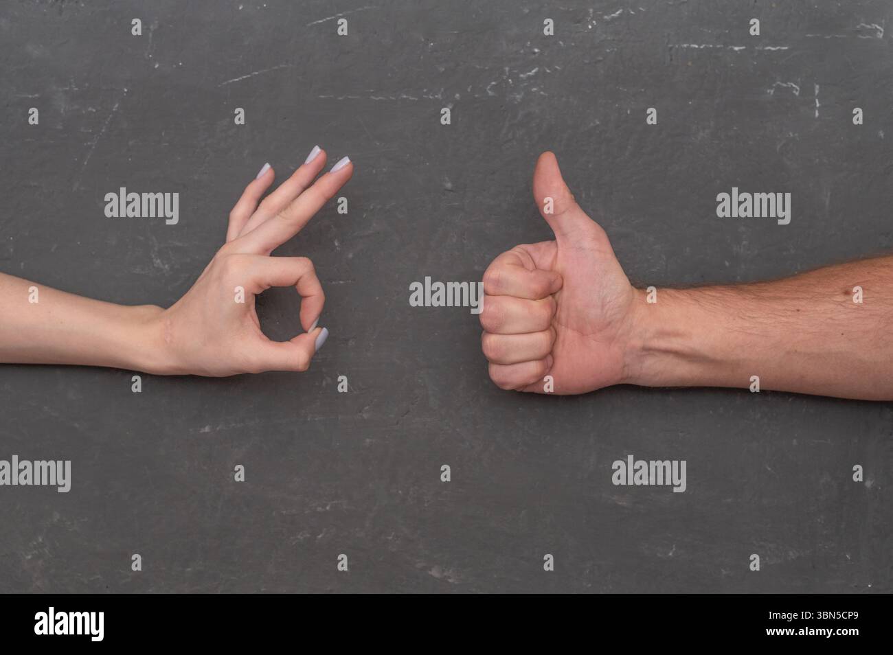 OK and thumbs up gestures reflect symbolic human interaction, gesture ...