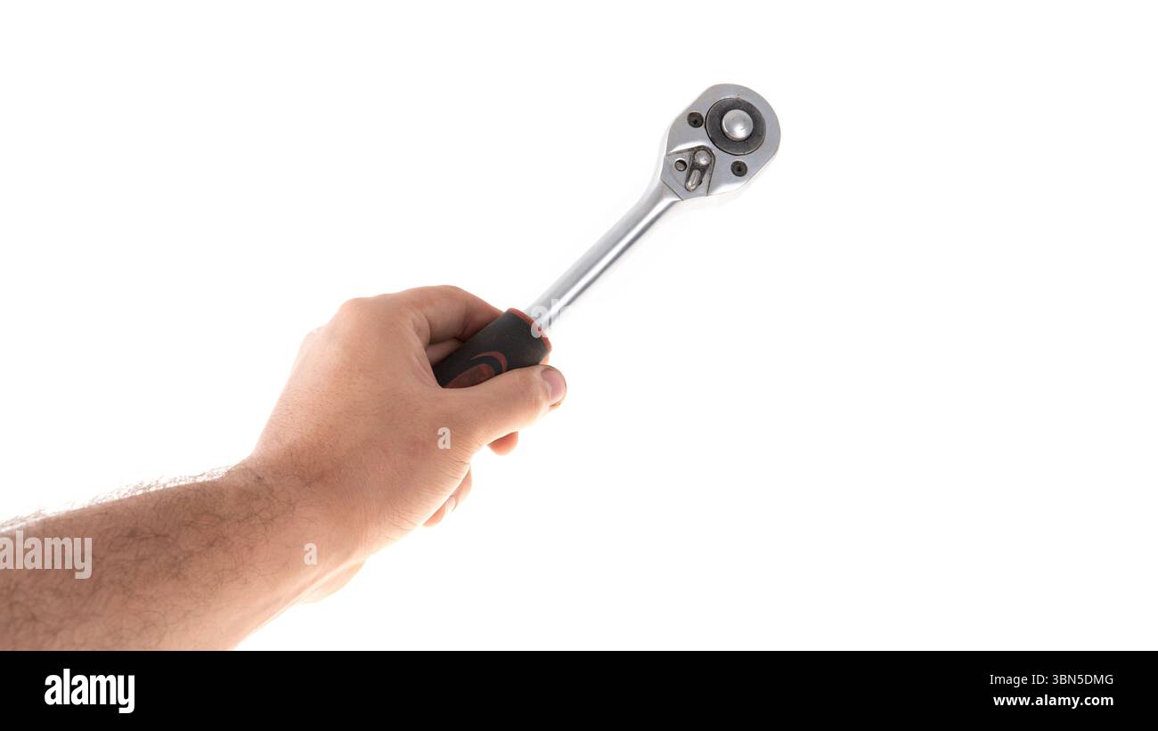 Hand with ratchet tool on white Stock Photo - Alamy