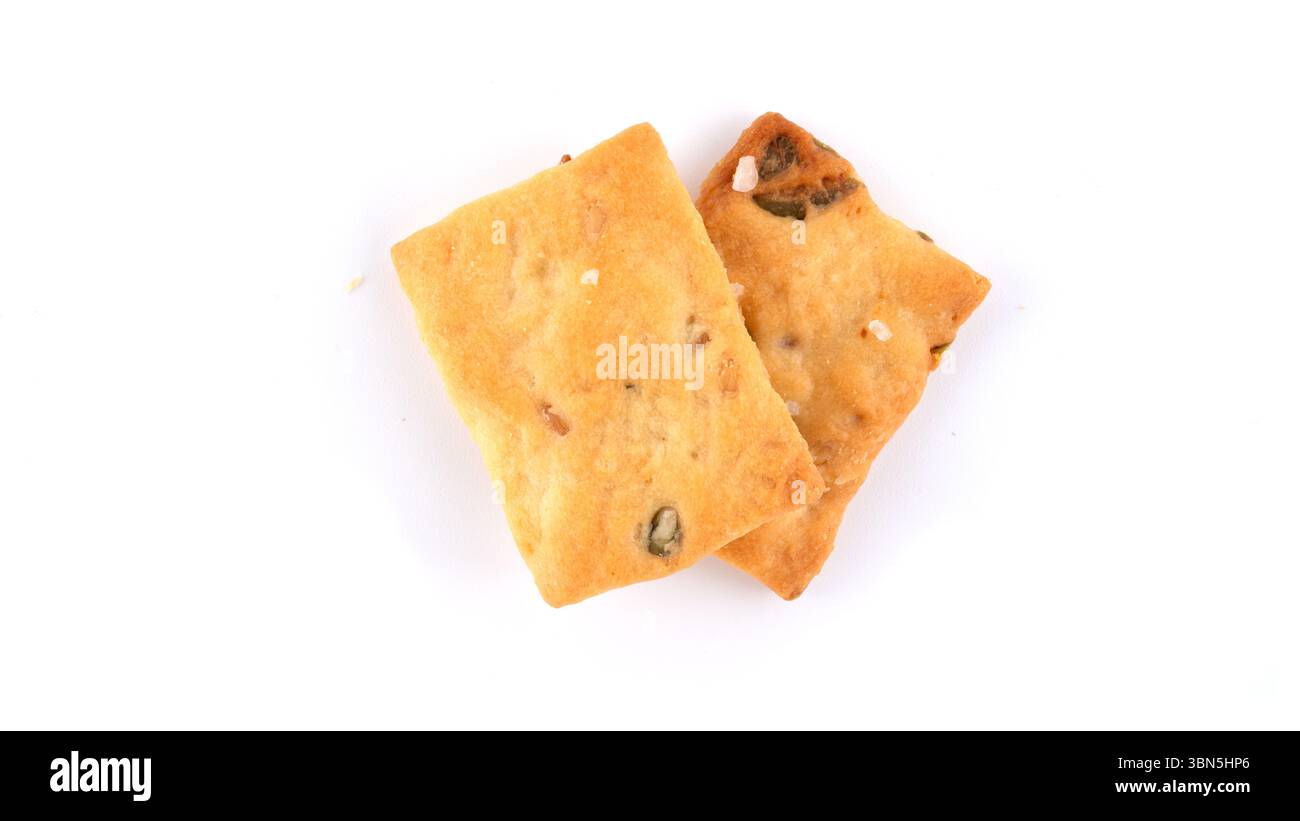 Savory baked crackers on white background Stock Photo - Alamy