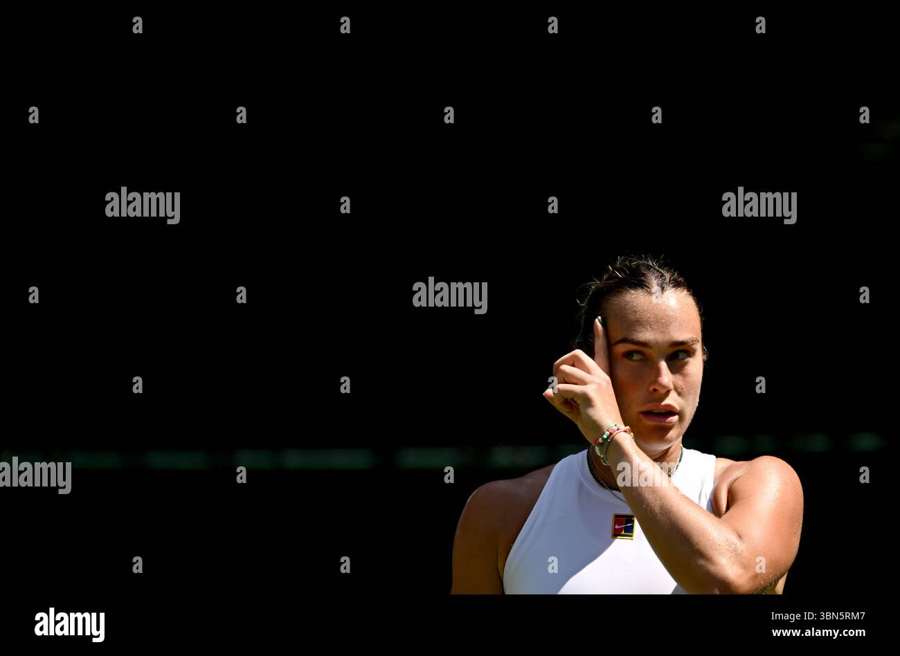 London, Britain. 30th June, 2025. Aryna Sabalenka reacts during the ...