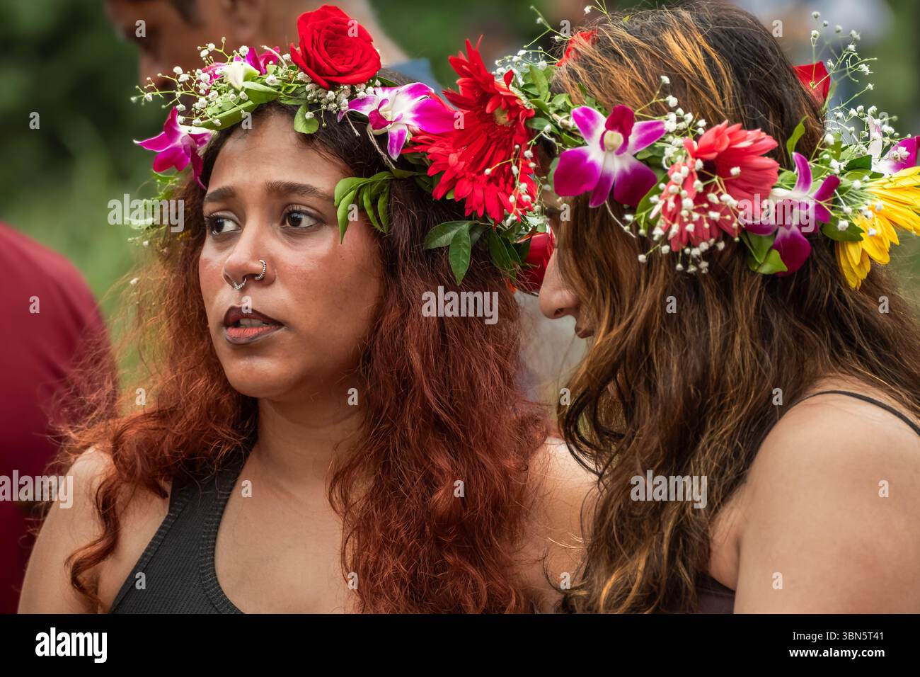 Parade of the traditional Goa carnival. Beautiful young women, wearing ...
