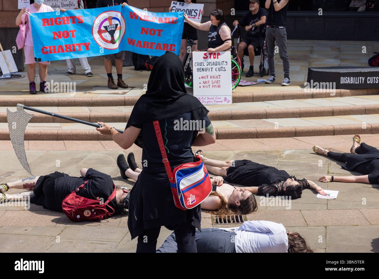 Leeds, UK. 30 JUN, 2025. Person in a Rachel Reeves mask poses over ...
