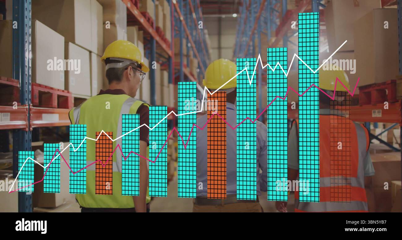 Warehouse workers wearing hard hats, vests studying inventory chart in ...