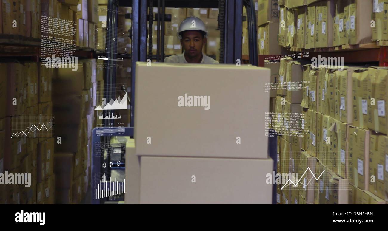 Operator wearing safety helmet lifting boxes with forklift in storage ...