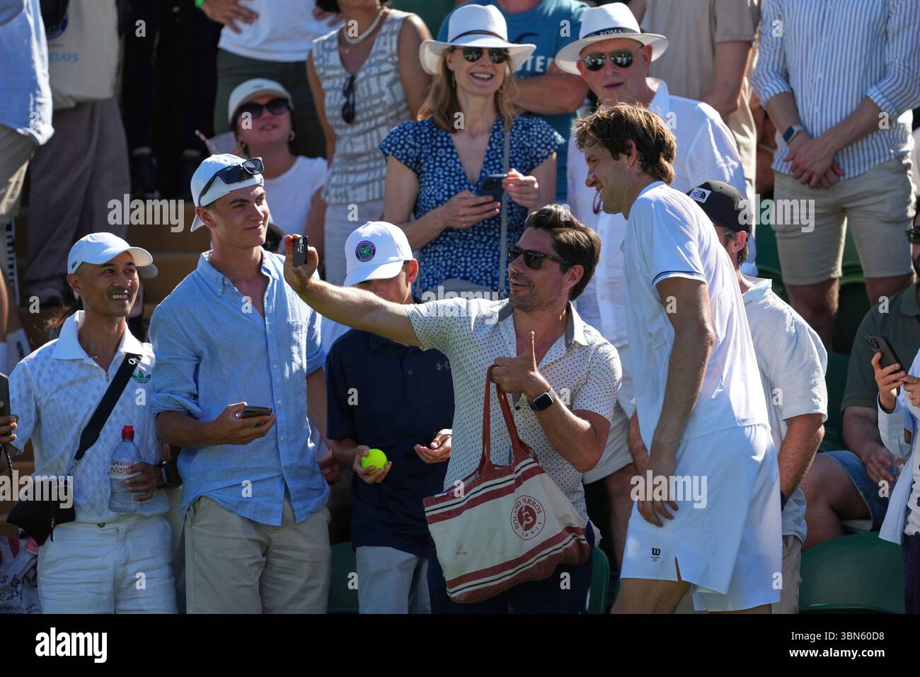 Nicolas Jarry of Chile poses for a selfie with fans after beating ...