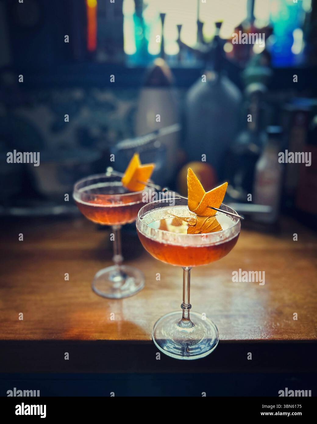 Two cocktails on counter of a home bar Stock Photo - Alamy