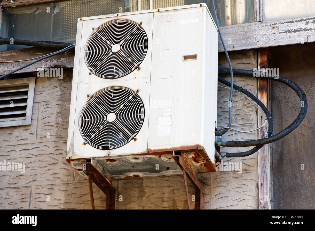 Heat pump condenser units for heating and cooling modern building Stock ...