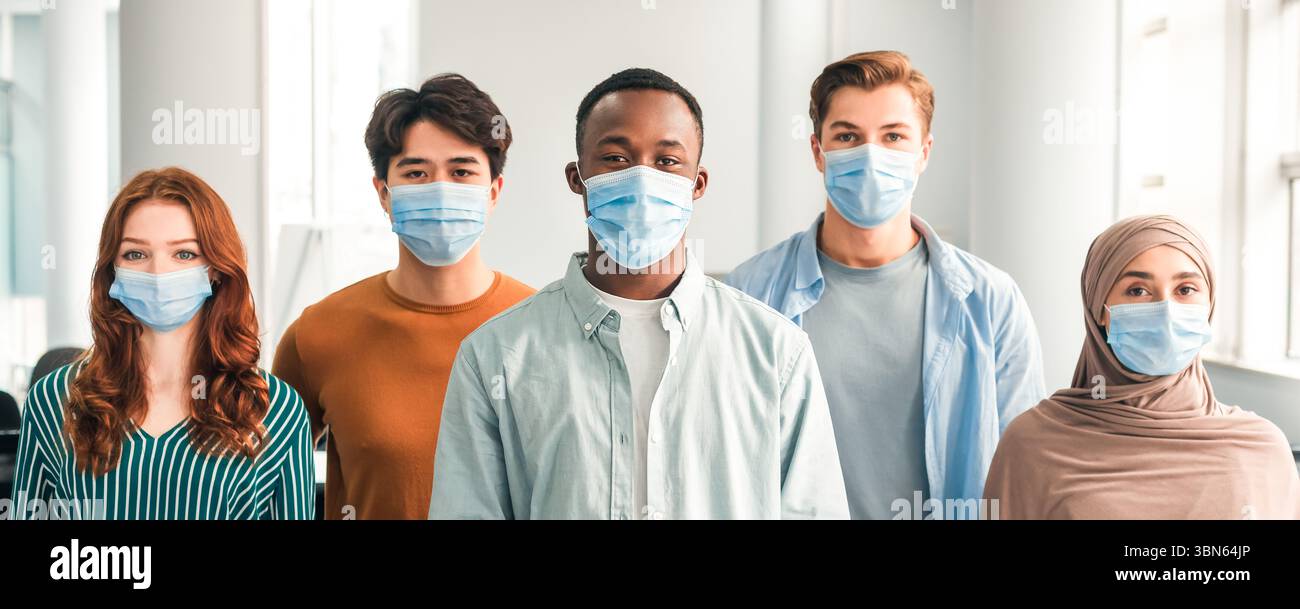 Diverse group wearing face masks hi-res stock photography and images ...